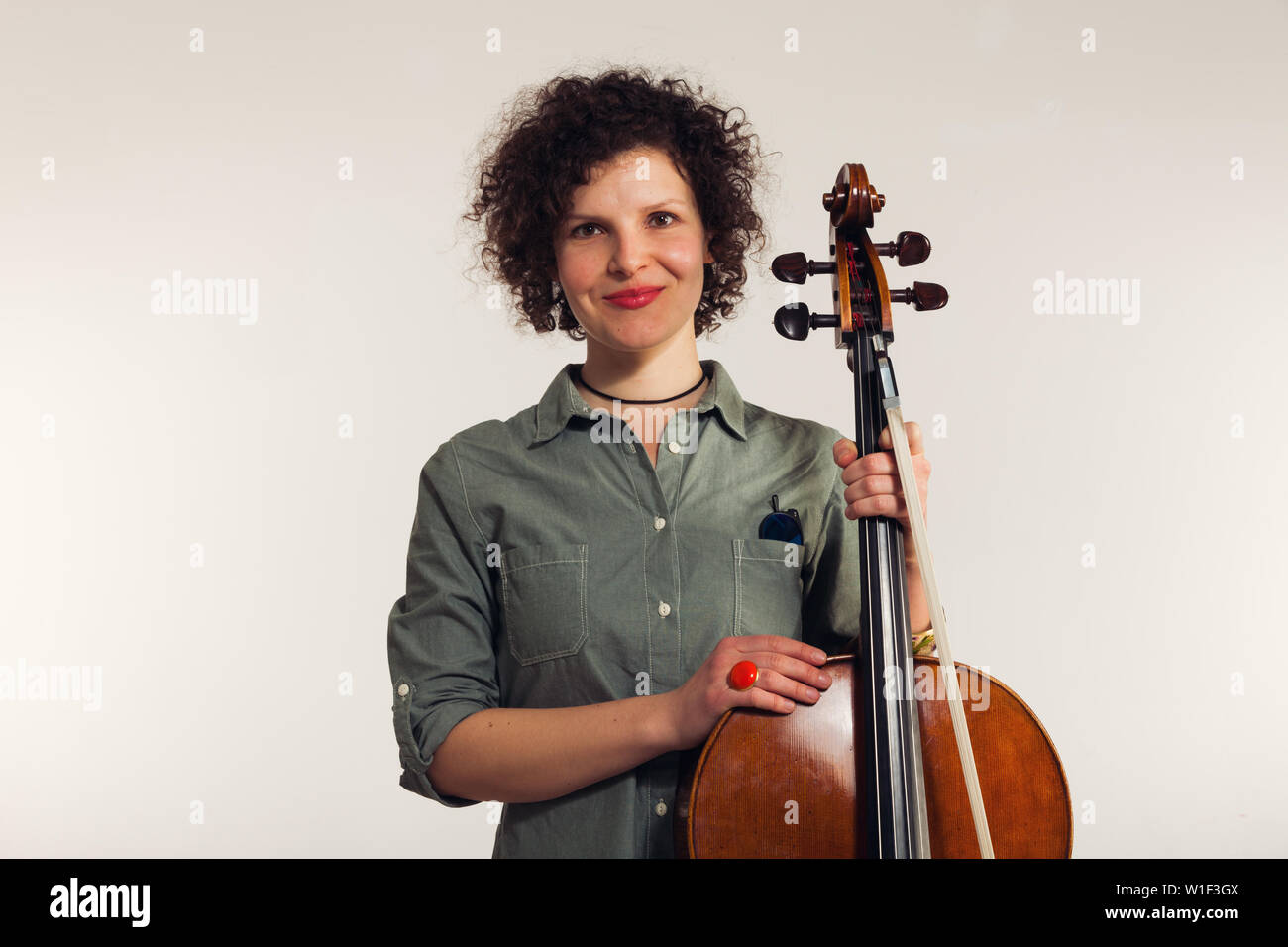 Portrait studio musician with his musical instrument. Year 2017 Stock ...