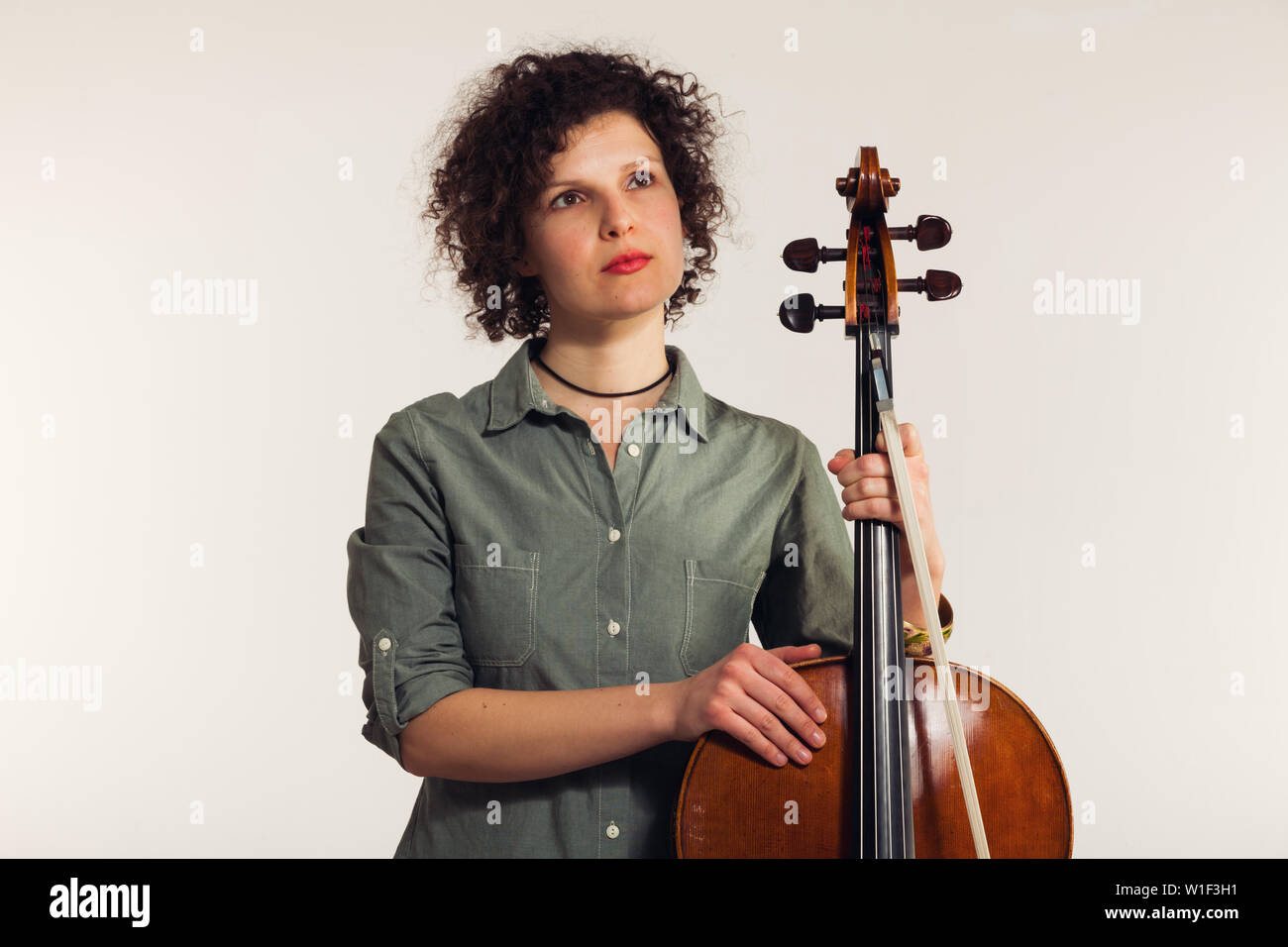 Portrait studio musician with his musical instrument. Year 2017 Stock ...