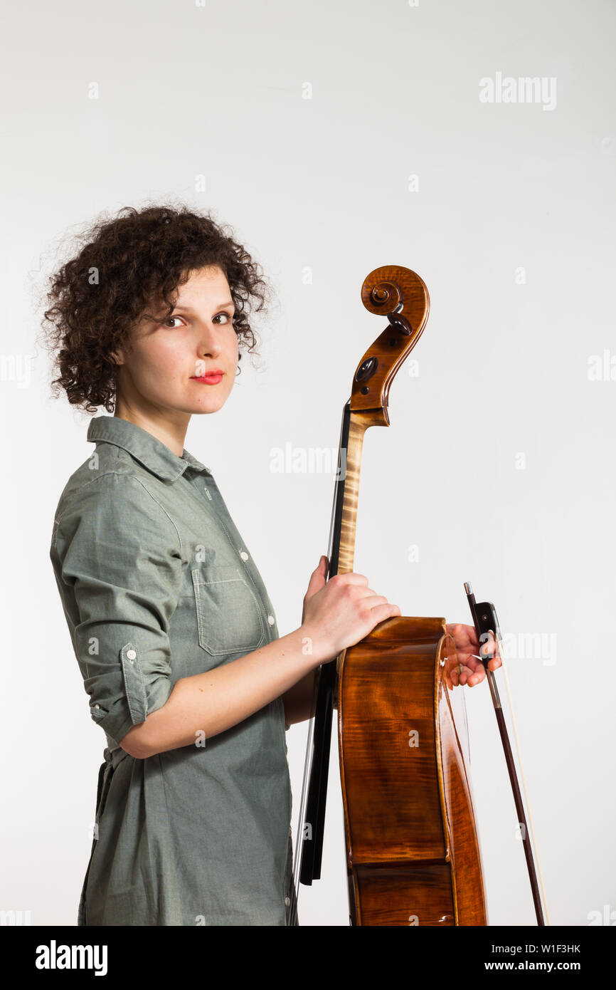 Portrait studio musician with his musical instrument. Year 2017 Stock ...