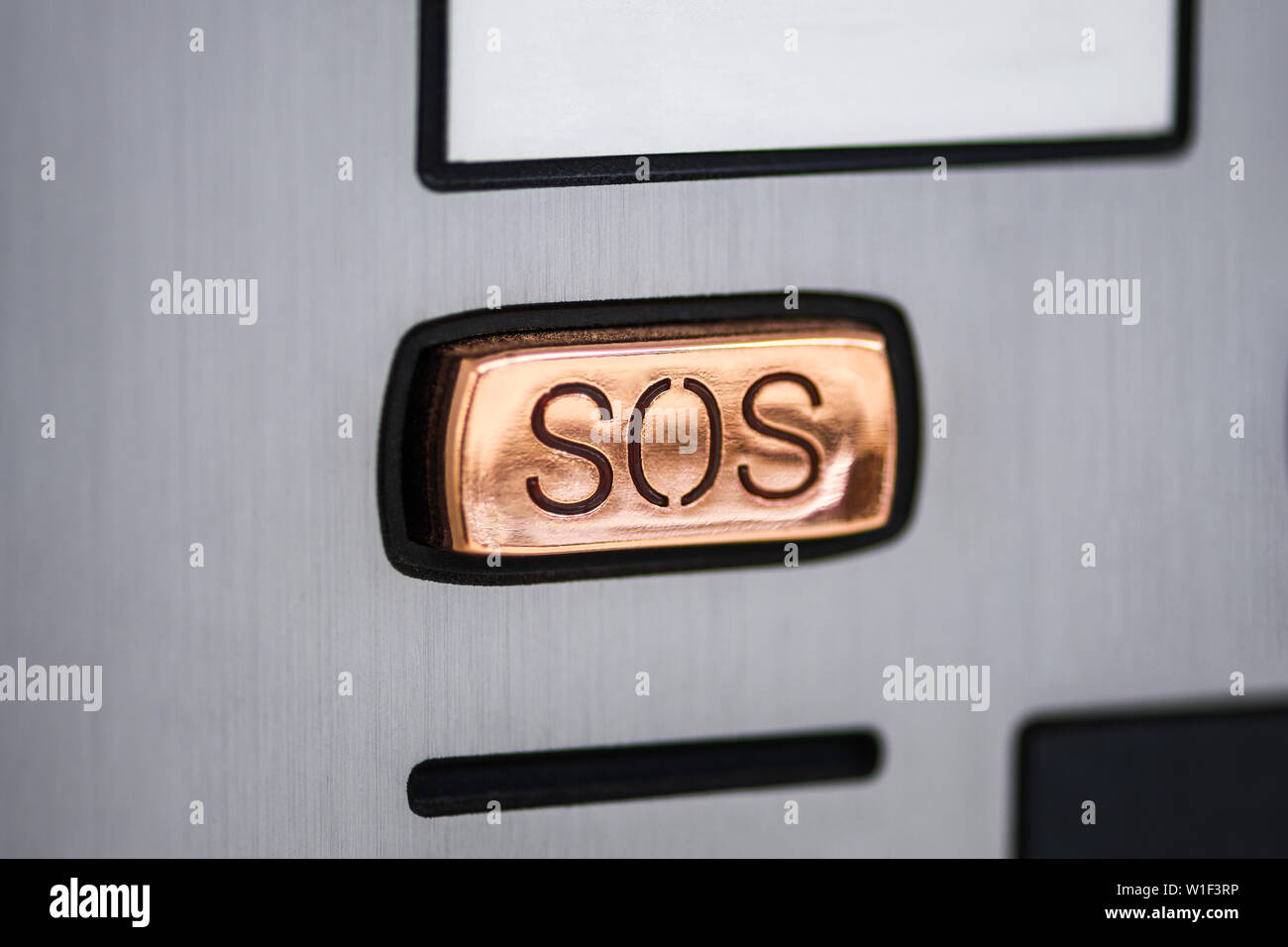 button SOS. SOS button close-up on the device panel, intercom. Help ...