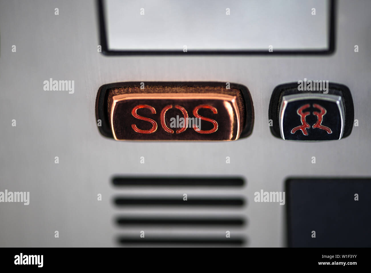 button SOS. SOS button close-up on the device panel, intercom. Help ...