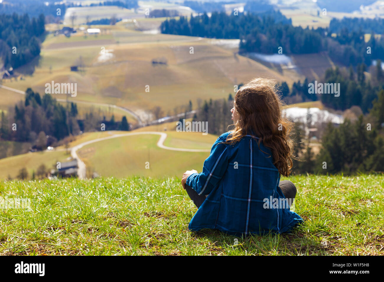 Girl watching the mountain landscape Stock Photo - Alamy