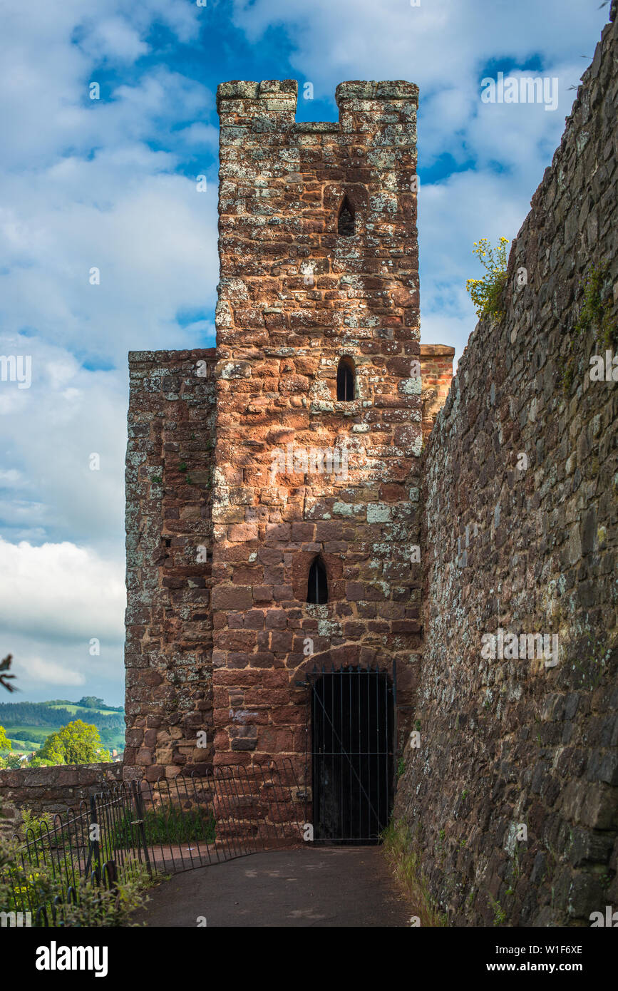View of surviving walls and tower of Rougemont Castle with Roman walls ...