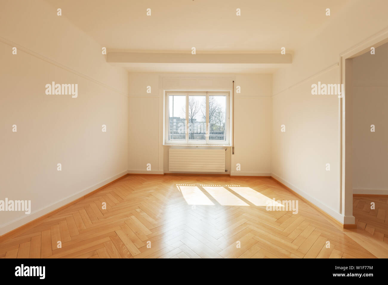 Interior of a modern empty room with a window Stock Photo - Alamy