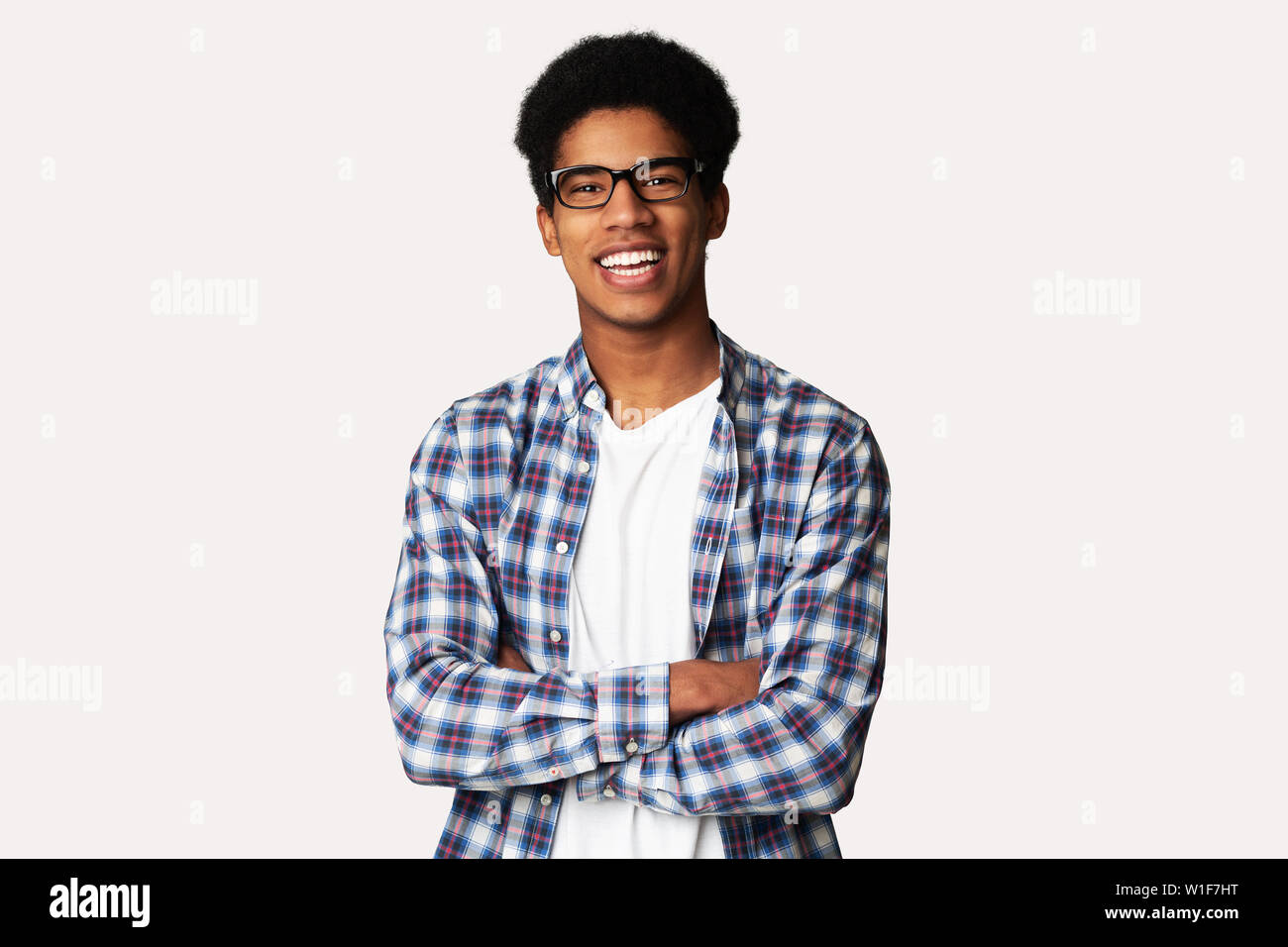 Crossed arms study hi-res stock photography and images - Alamy