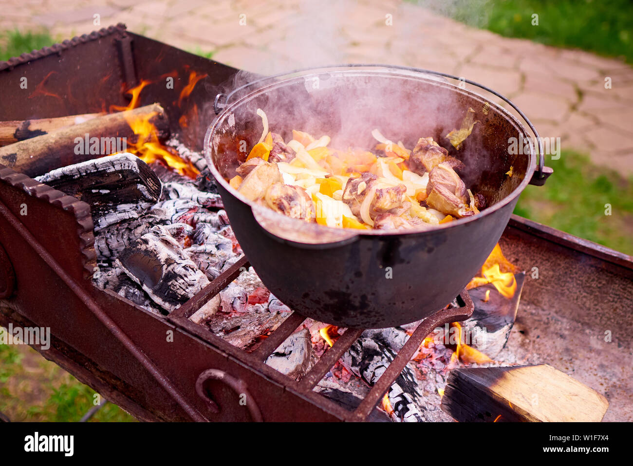 Cooking pilaf on the campfire hi-res stock photography and images - Alamy