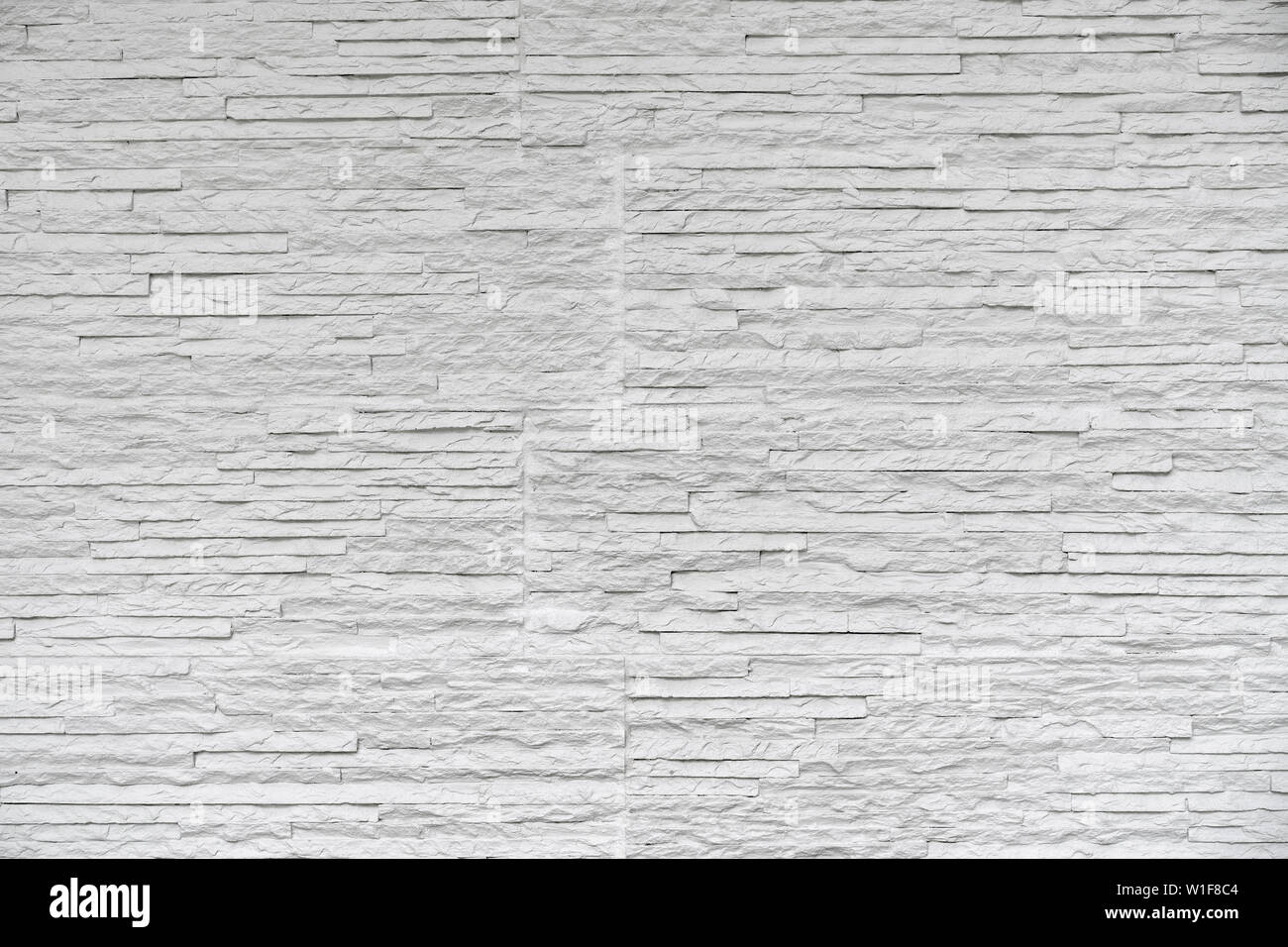 White classic stone brick are arranged to pattern on the wall for ...