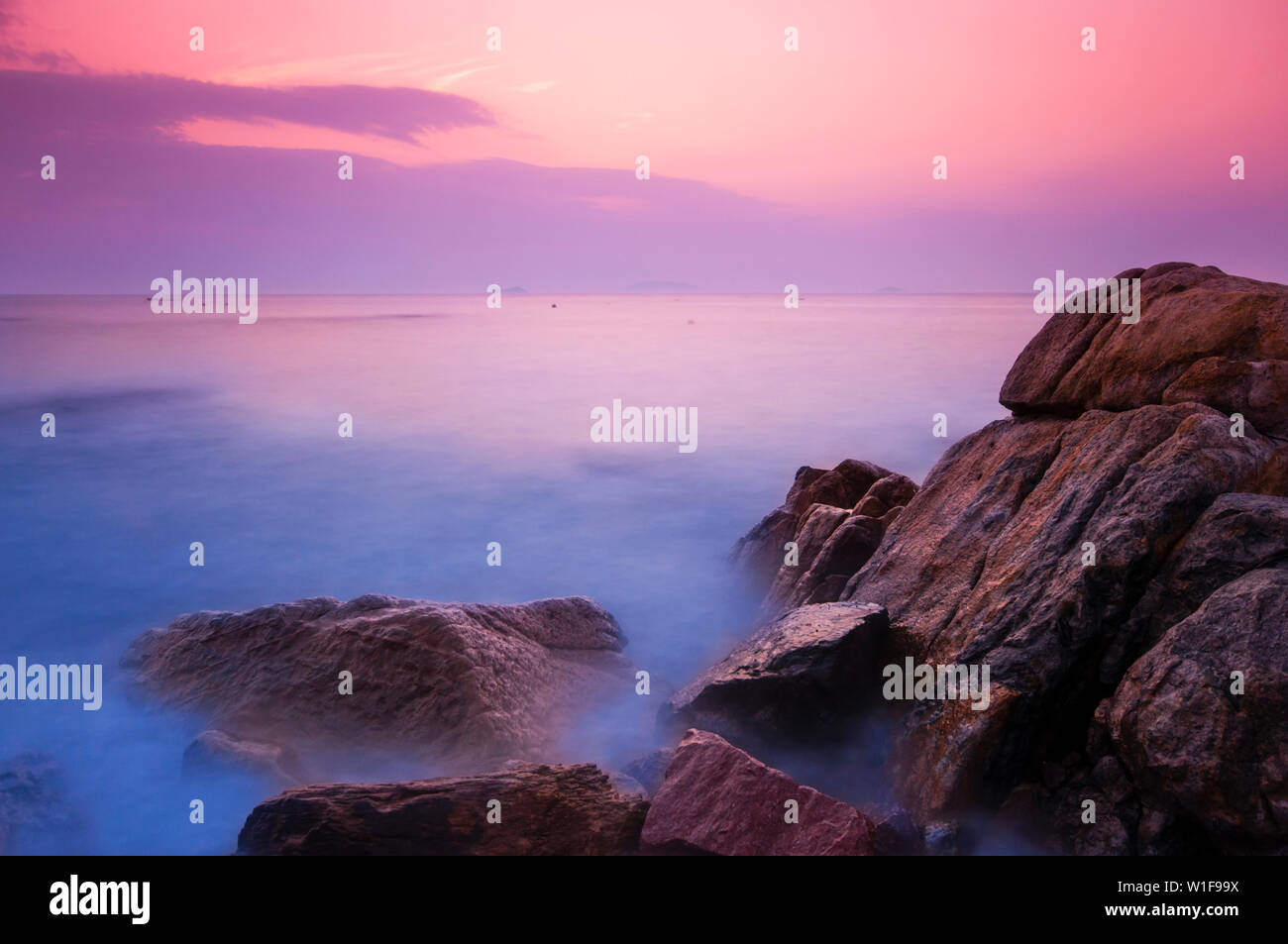 seashore water sea dusk dawn Stock Photo - Alamy