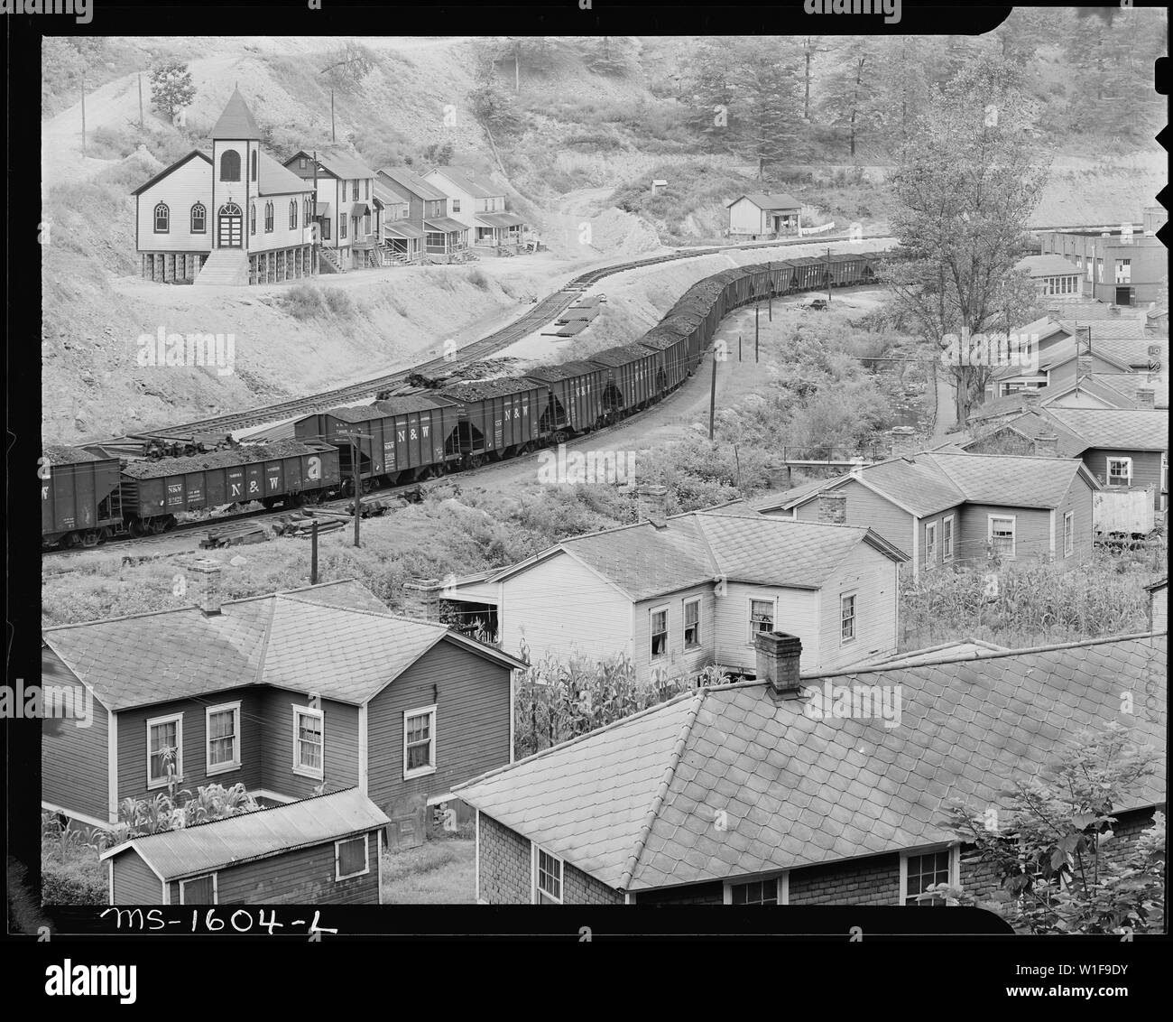 Houses, coal cars, and church. Note that roofs are asbestos and are in ...