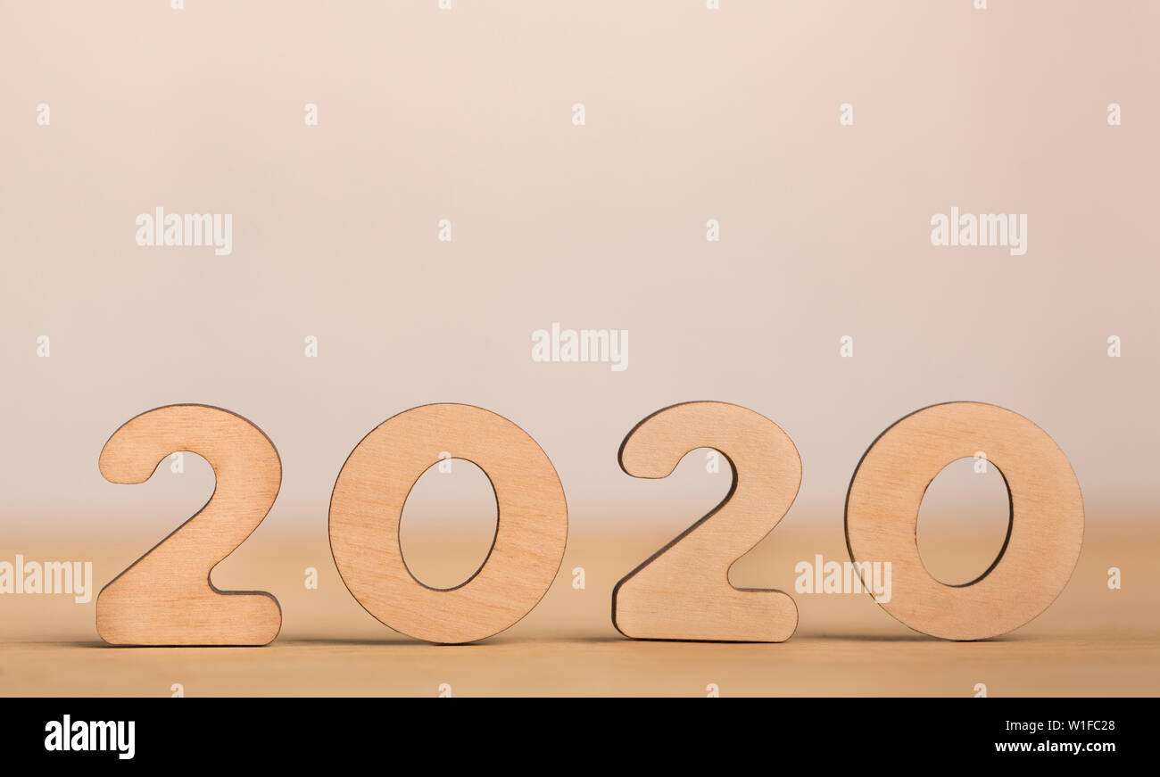 Wooden numbers with round corners on light background Stock Photo - Alamy