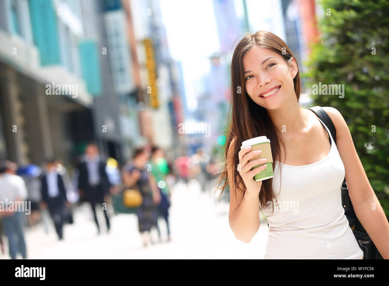 Woman commuter walking hi-res stock photography and images - Alamy