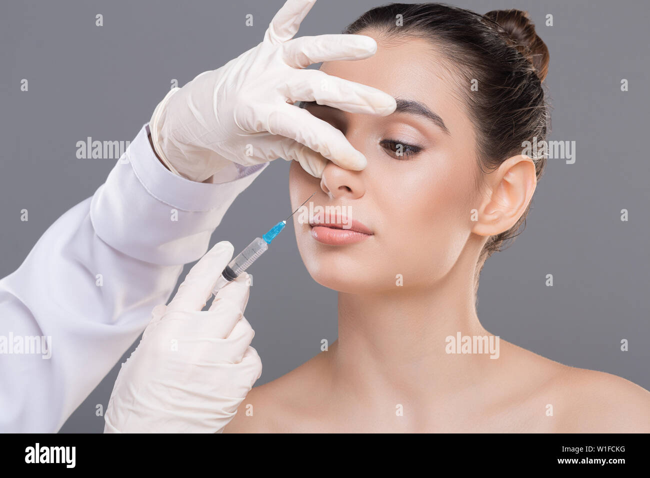 Women injected the cosmetic ingredients to the nose Stock Photo - Alamy