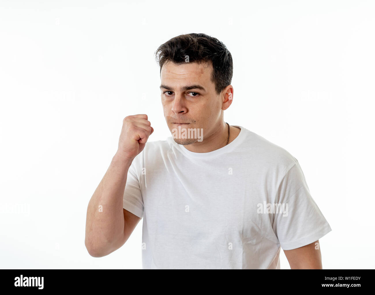 Close up portrait of an attractive young caucasian man with angry face ...