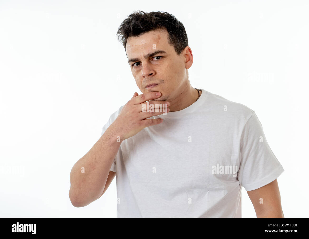 Close up portrait of an attractive young caucasian man with angry face ...