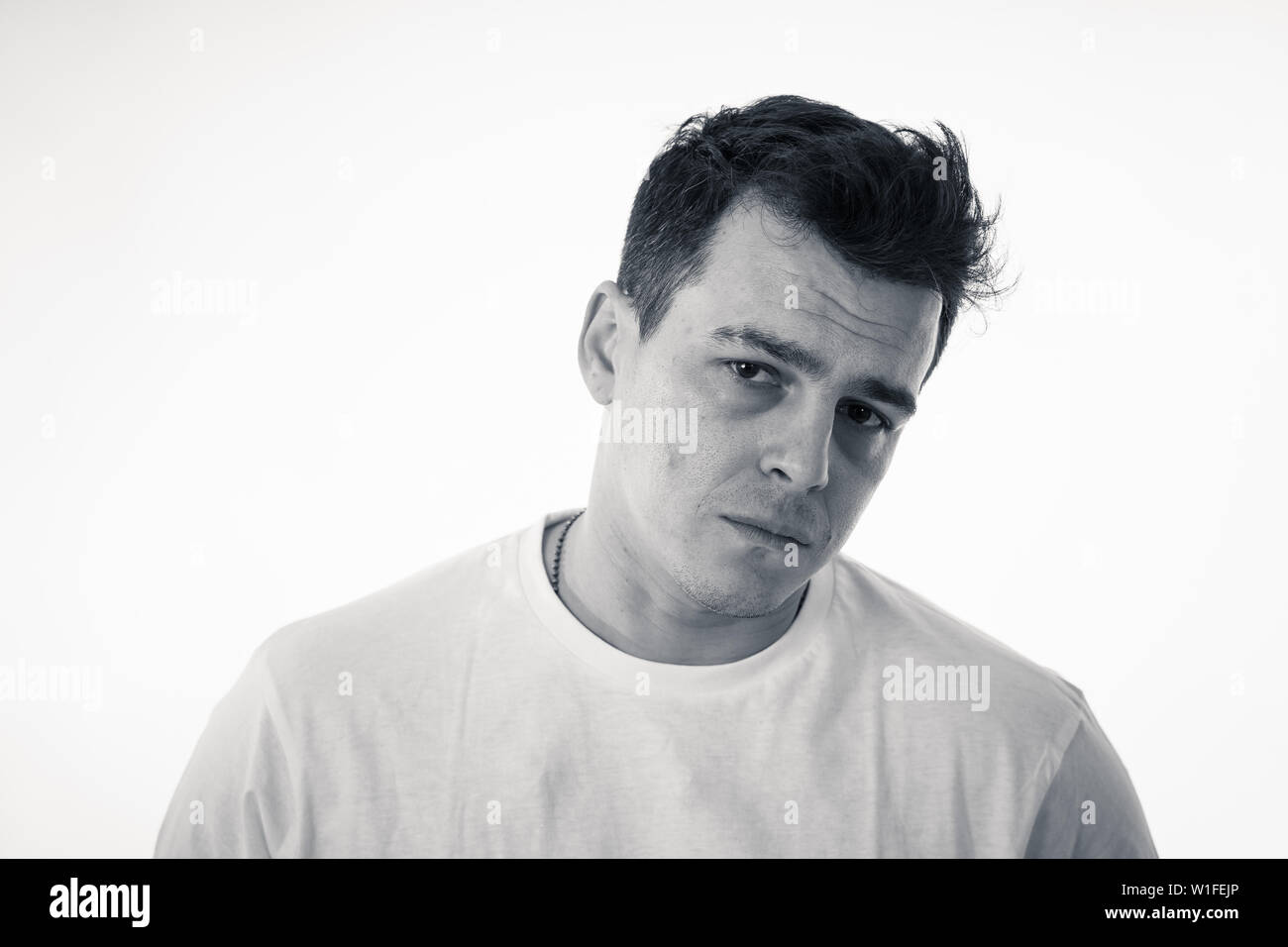 Close up portrait of attractive sad depressed man suffering depression ...