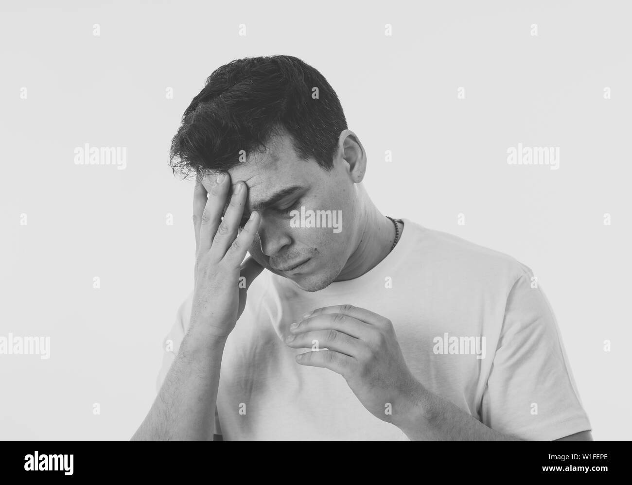 Close up portrait of attractive sad depressed man suffering depression ...