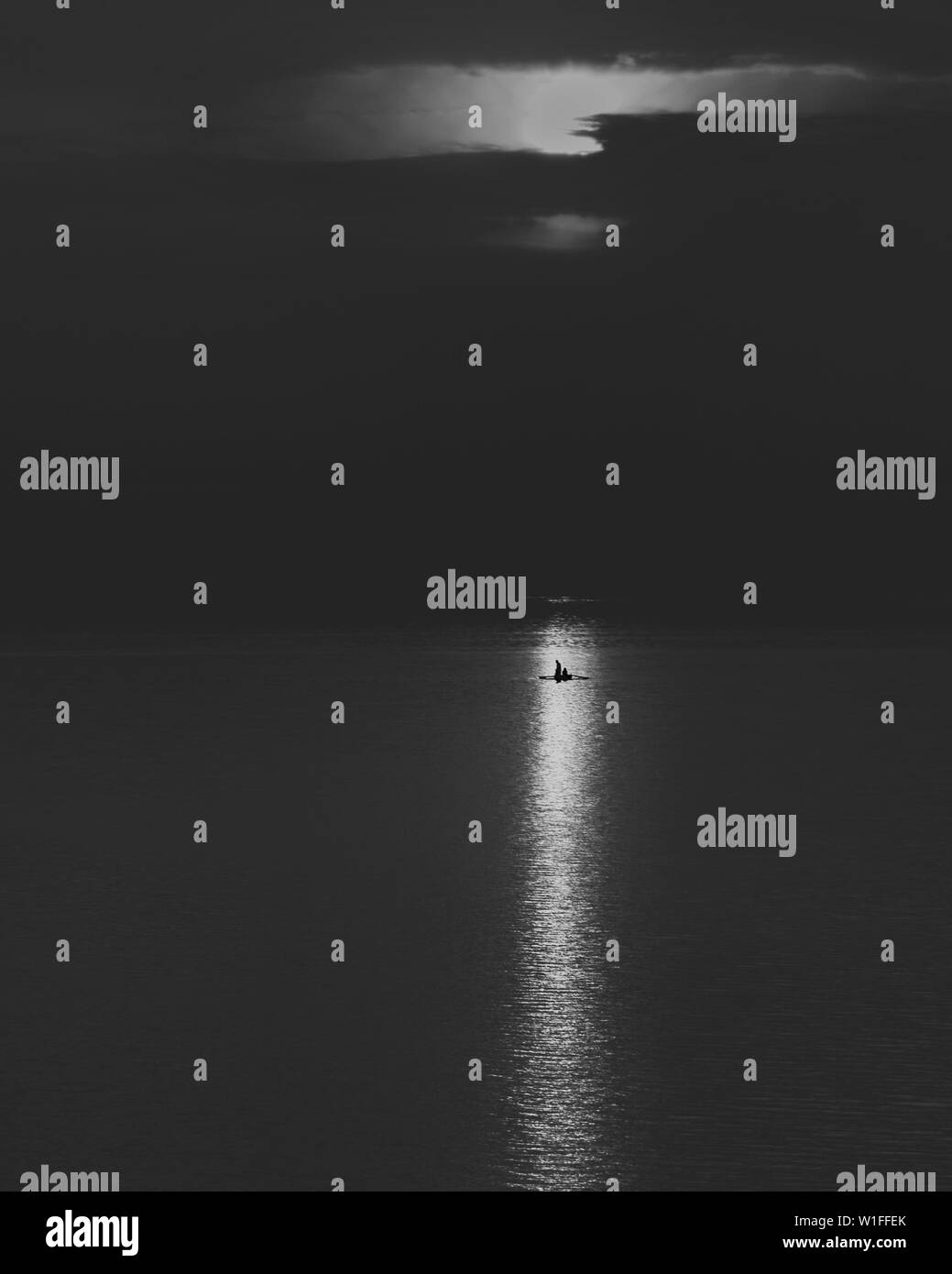 ocean monochrome moon reflection beach Stock Photo - Alamy