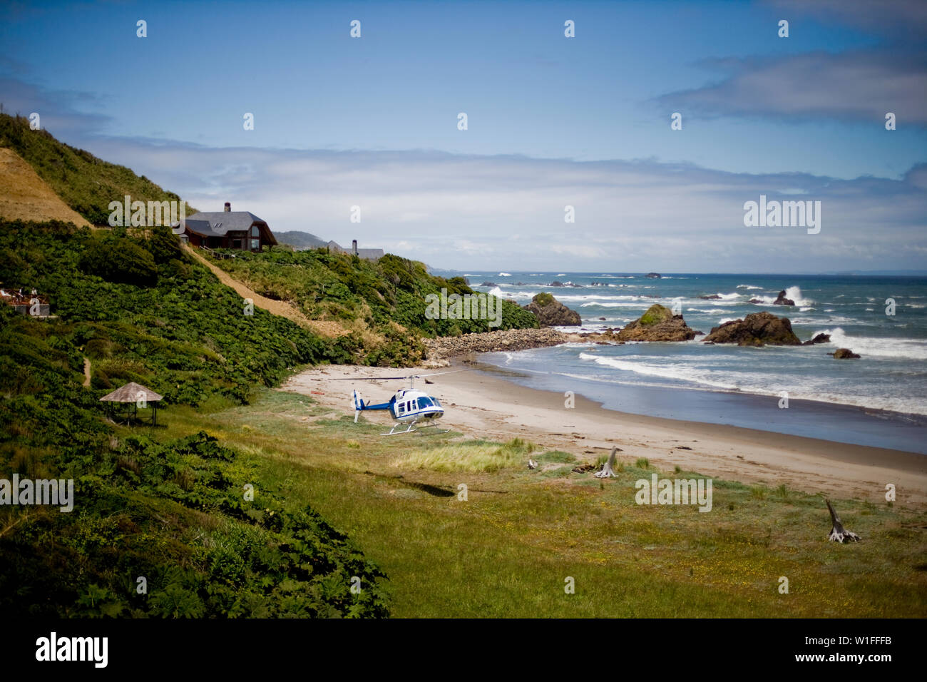 Helicopter landing on a remote beach Stock Photo - Alamy