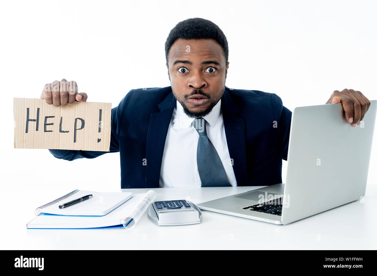 Desperate african american businessman with laptop computer suffering ...