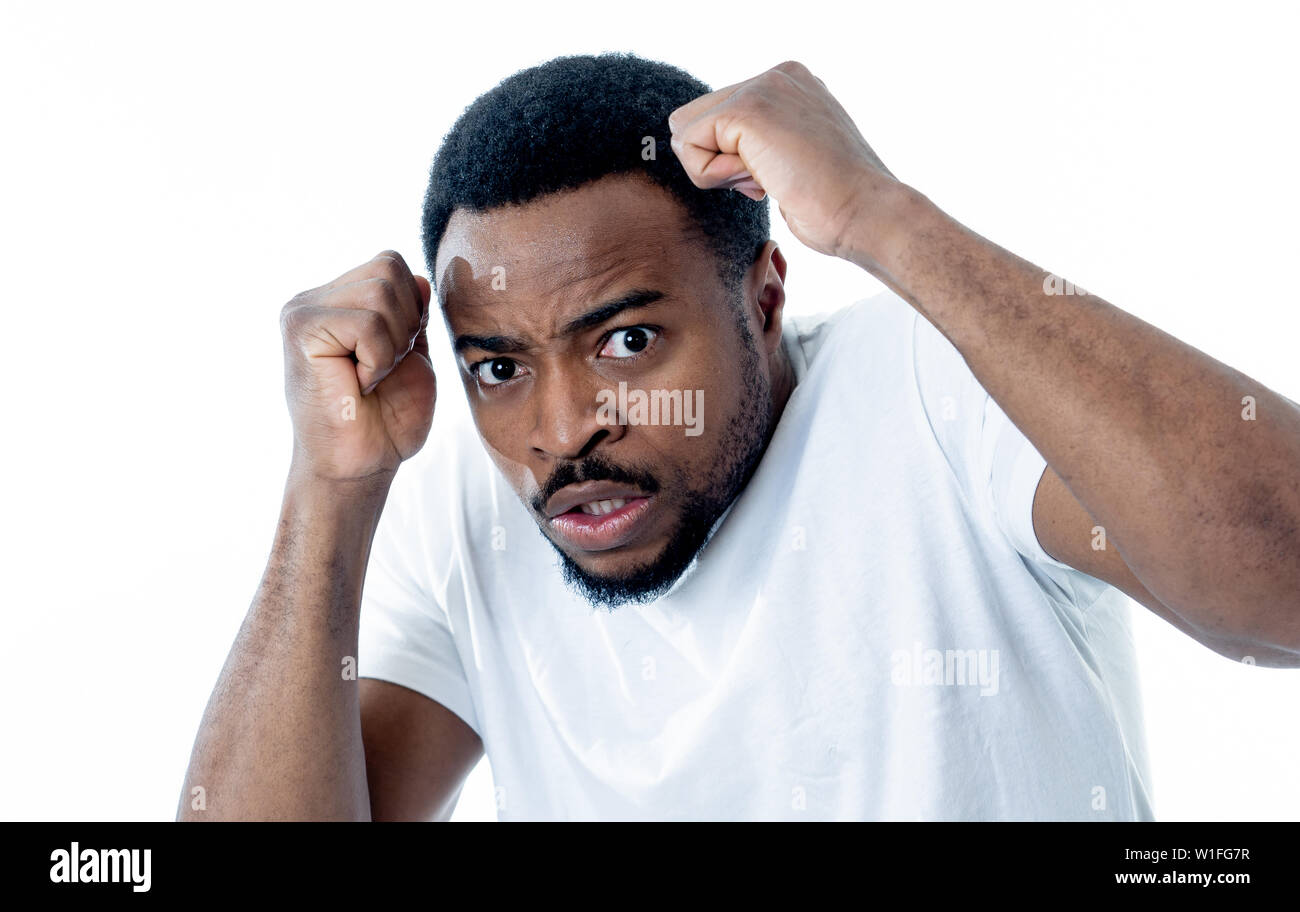 Portrait of Handsome young man in shock with a scared expression on his ...