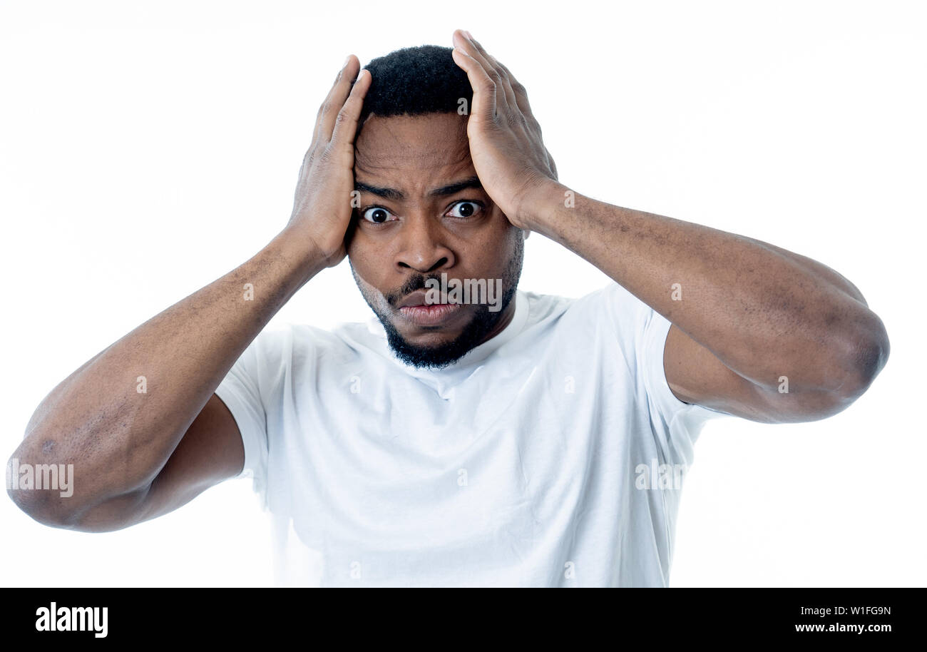 Portrait of Handsome young man in shock with a scared expression on his ...