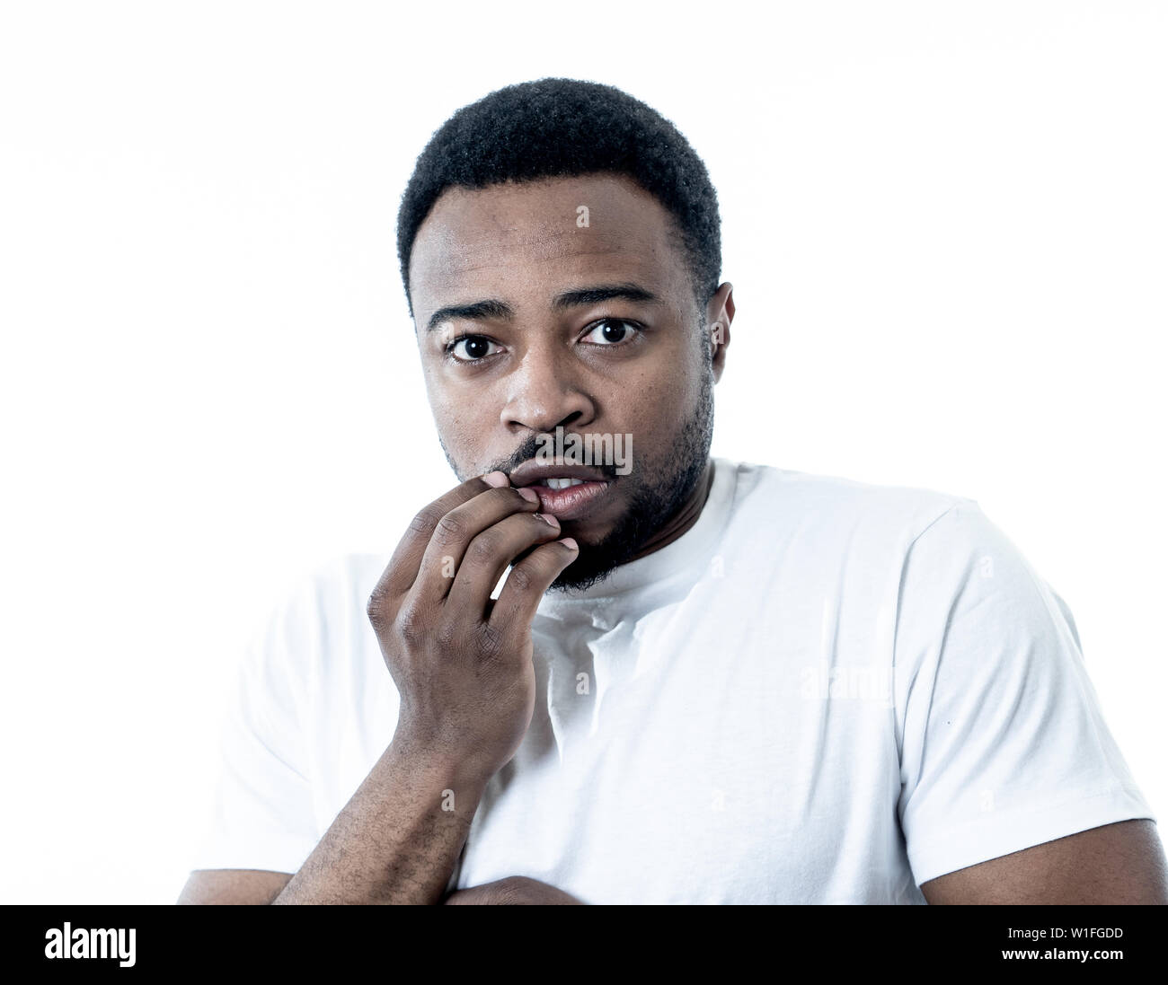 Portrait of Handsome young man in shock with a scared expression on his ...