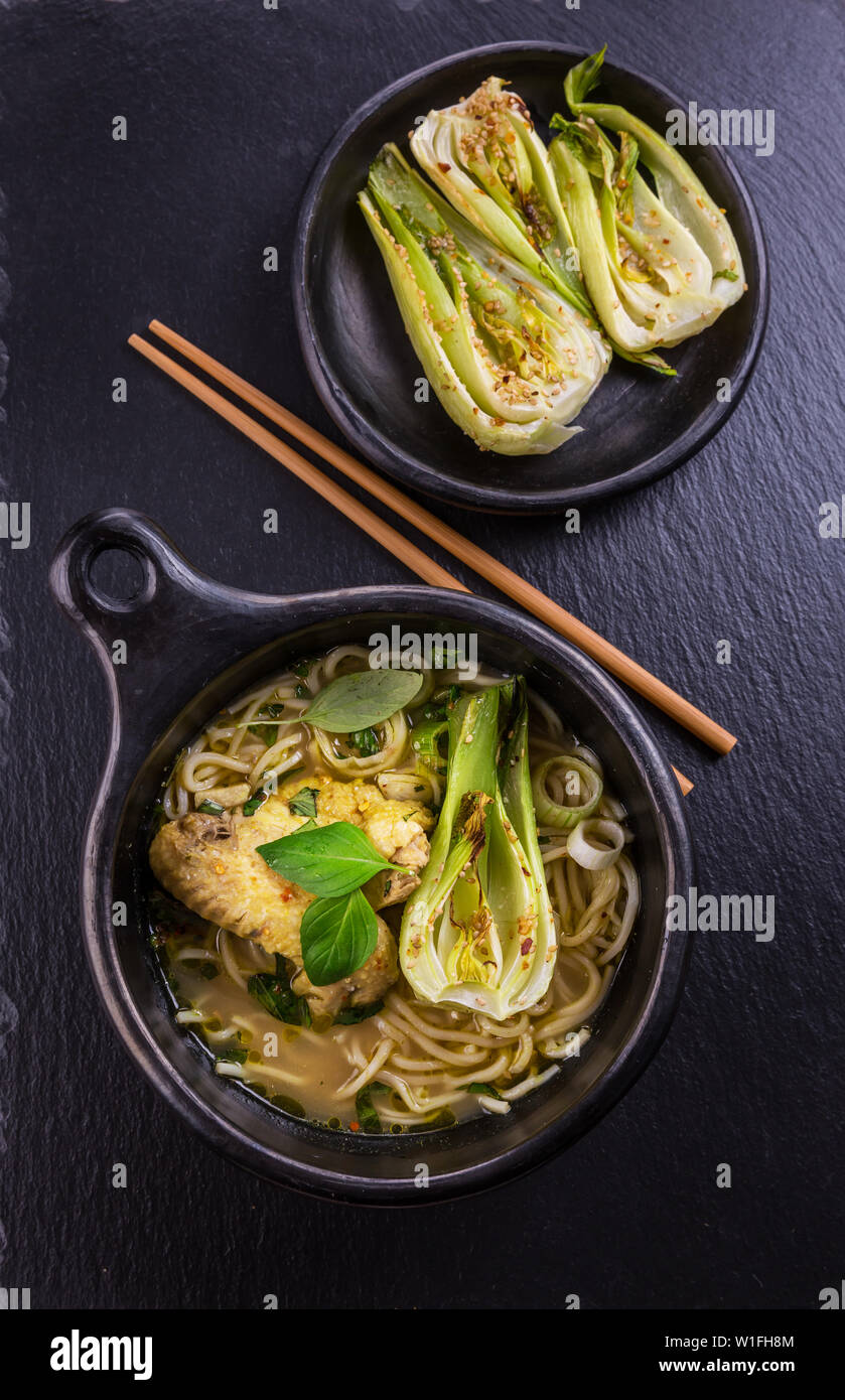 Hot Thai green curry chicken soup with pak choi and mushrooms Stock ...