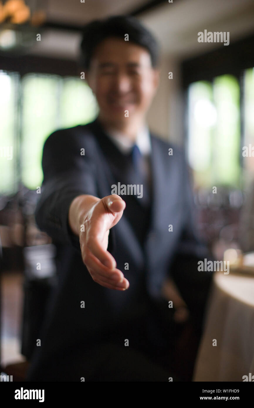 Man extending the hand at front hi-res stock photography and images - Alamy