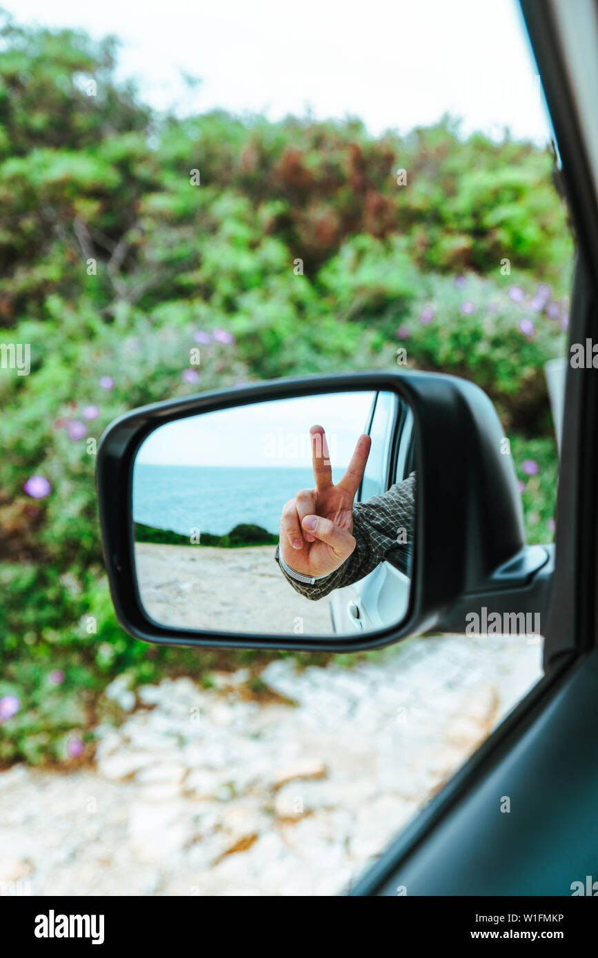 sea reflection in car rear mirror. road trip. summer vacation Stock ...