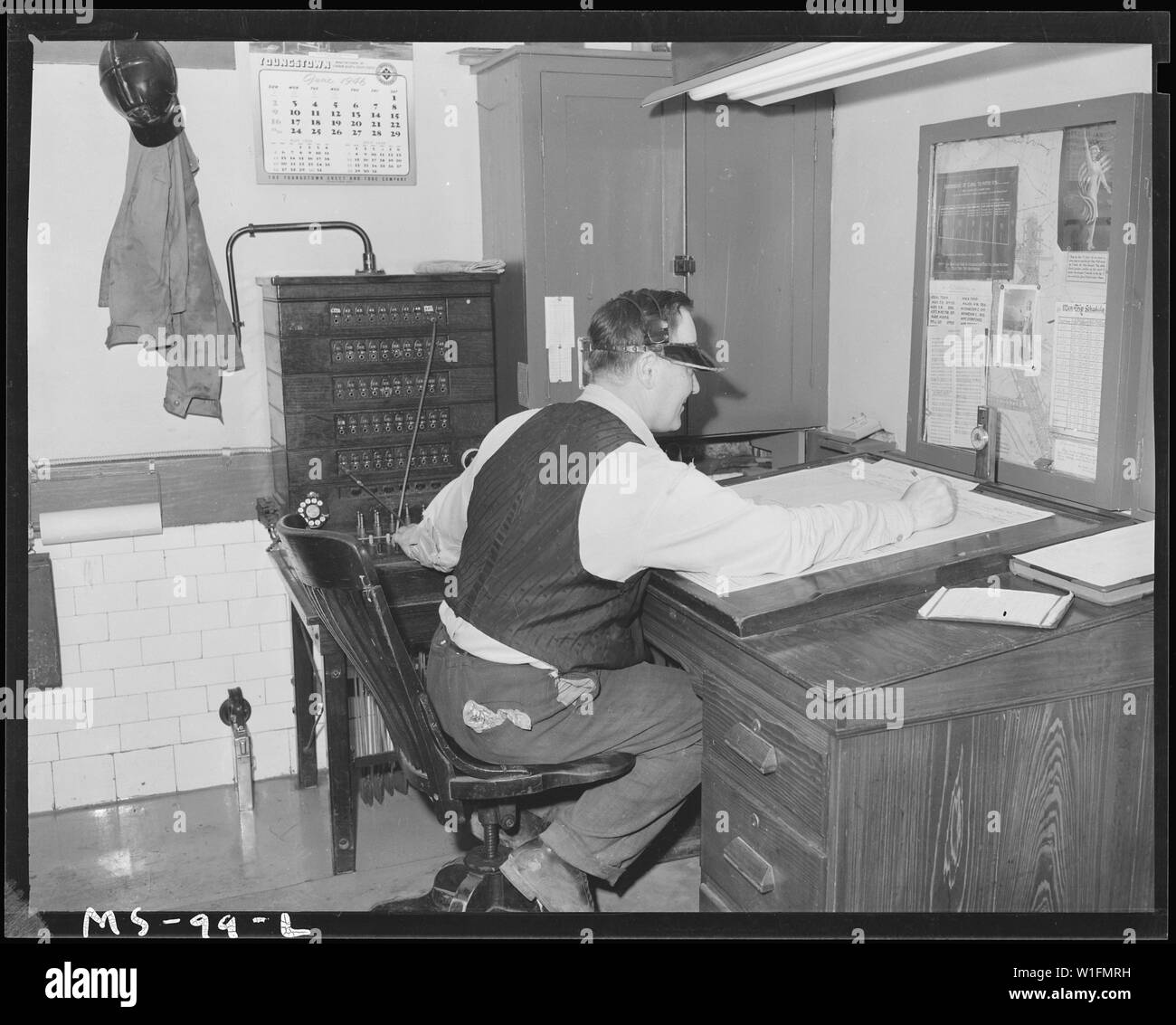 Joseph Popson, switchboard opertator in underground central telephone ...