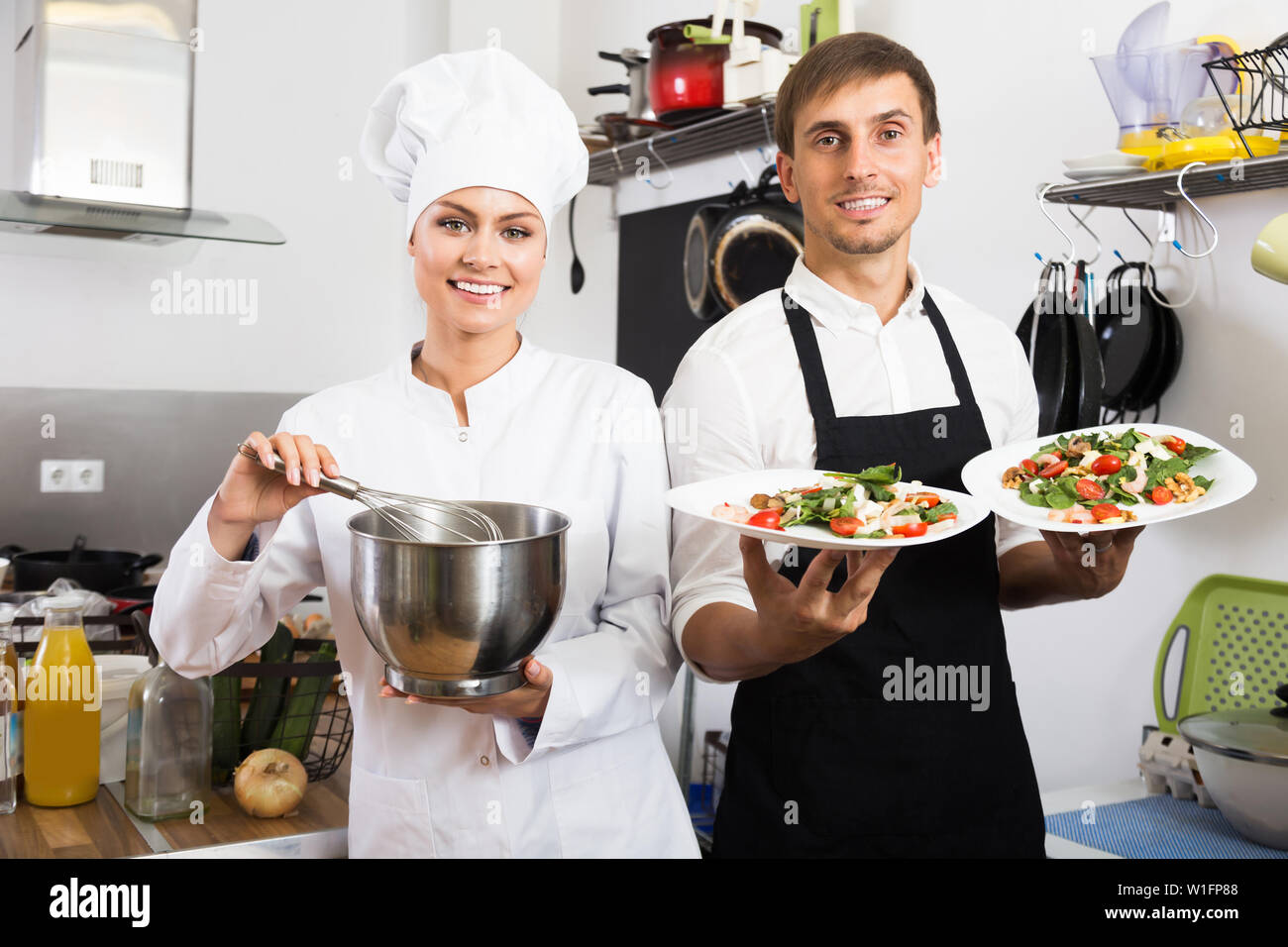 Woman taking plate vegetables hi-res stock photography and images - Alamy