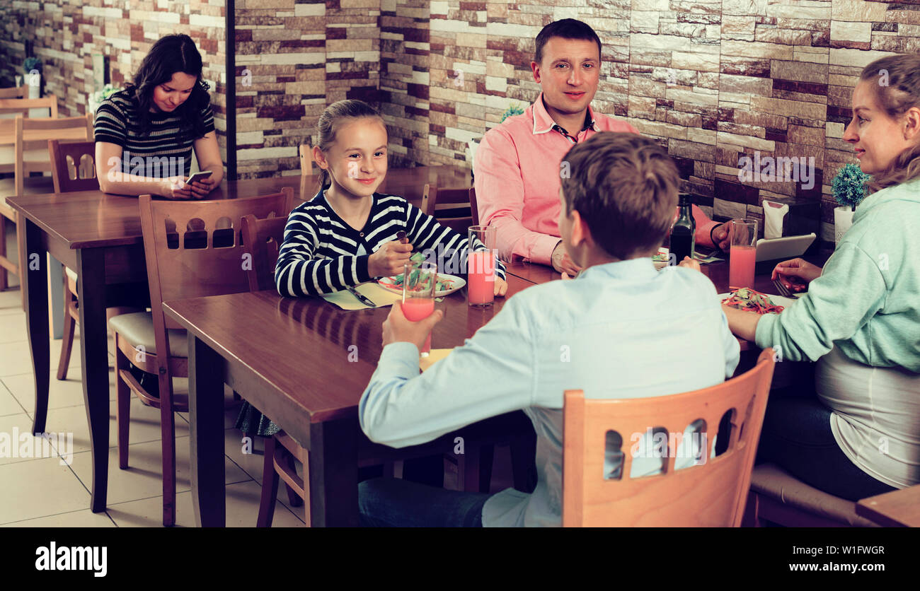 Serious conversation parents children hi-res stock photography and ...