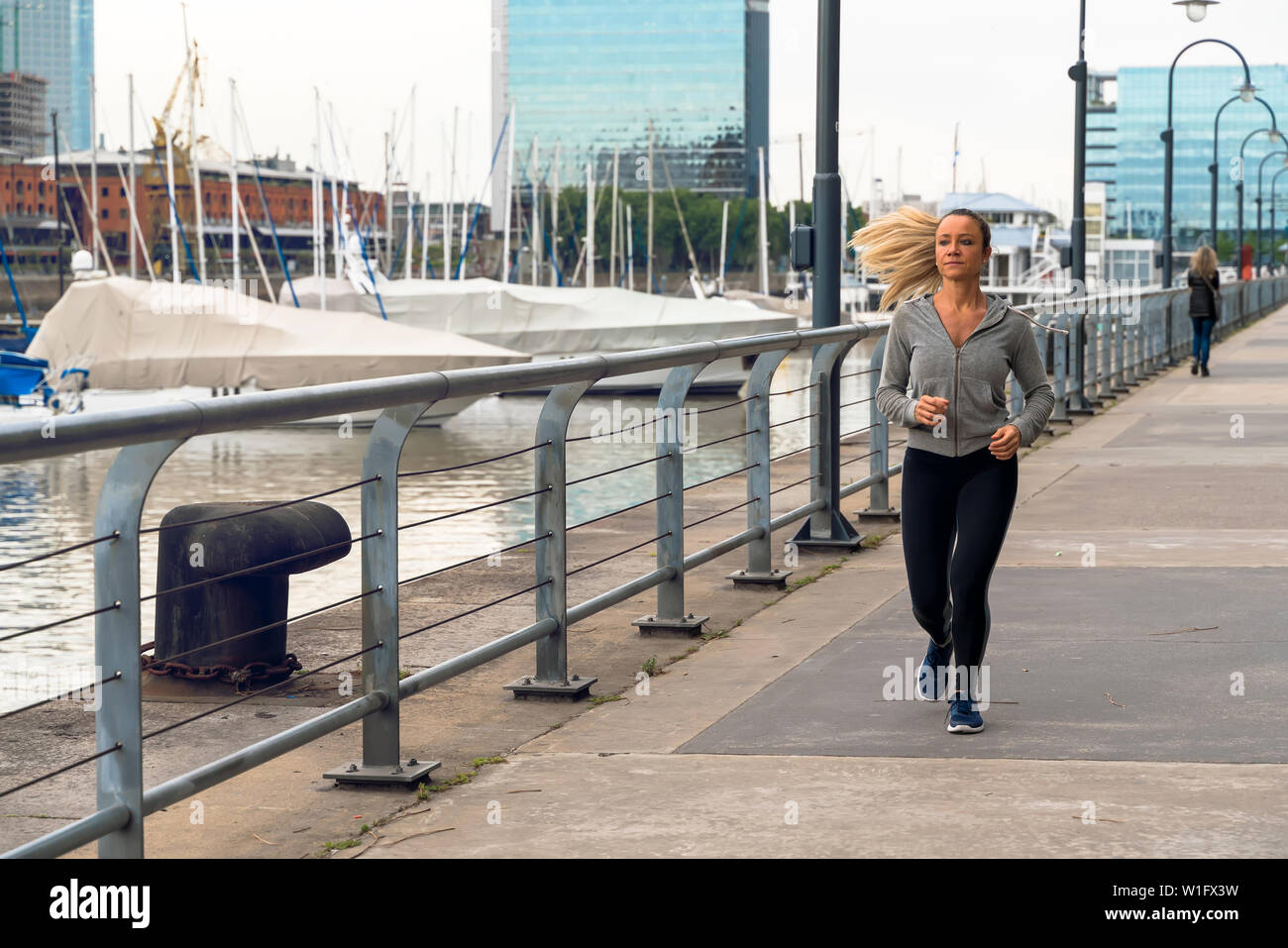 Running girl next to river hi-res stock photography and images - Alamy