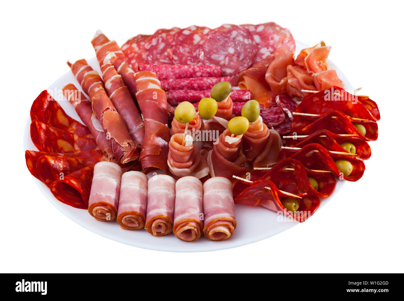 Traditional Spanish meat platter - sliced dry-cured jamon, bacon and ...