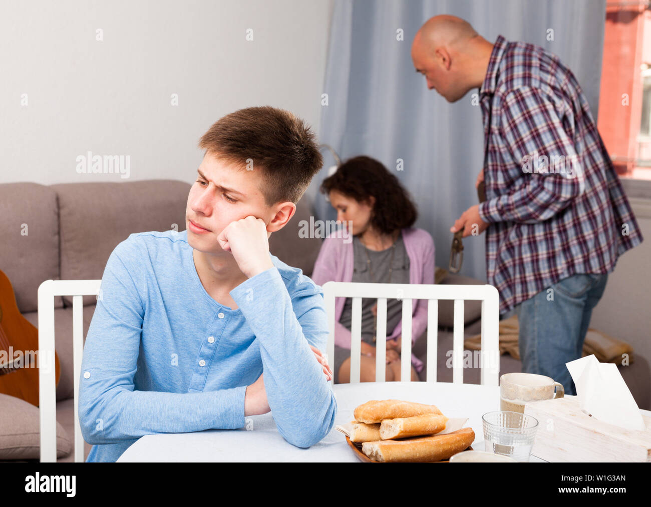 Teenager boy frowning hi-res stock photography and images - Alamy