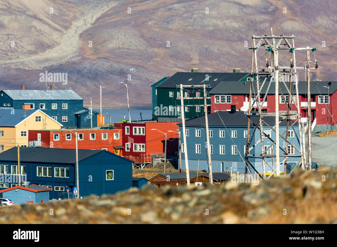 overview of longyearbyen, colored houses with mountains in the ...