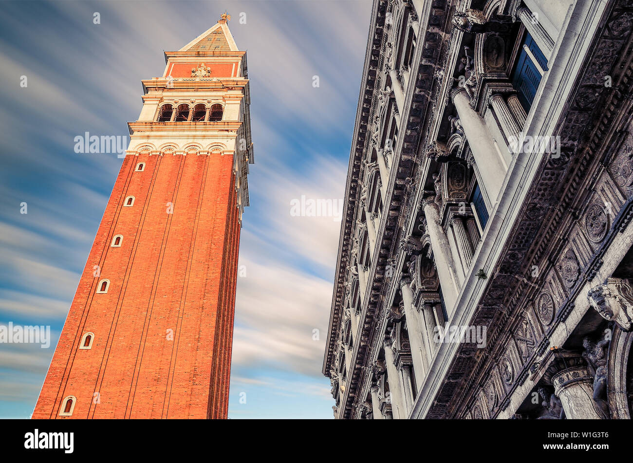 Architecture in detail. The facade of a building, whose tower rises ...