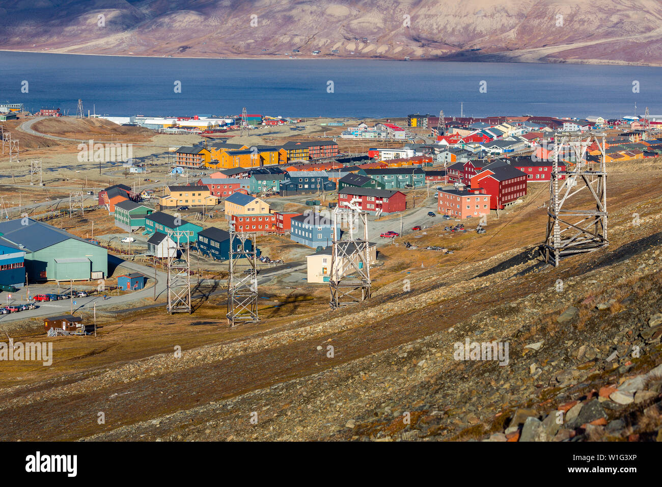 overview of longyearbyen, colored houses with mountains in the ...