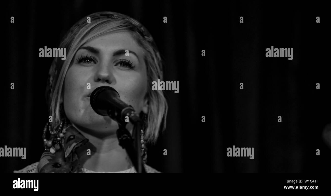 Female country singer Black and White Stock Photos & Images - Alamy