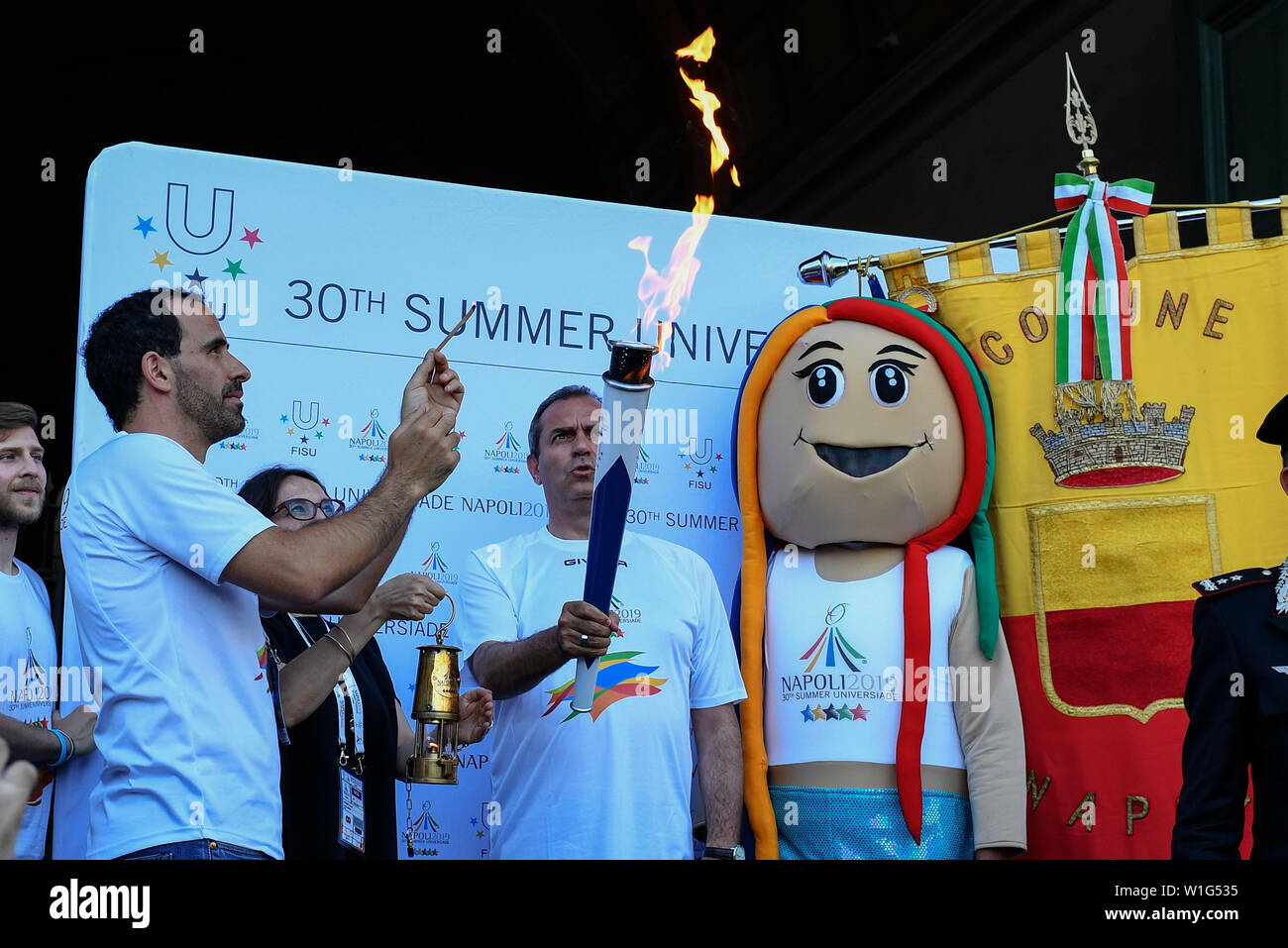 The mayor of Naples Luigi De Magistris with the torch of the ...