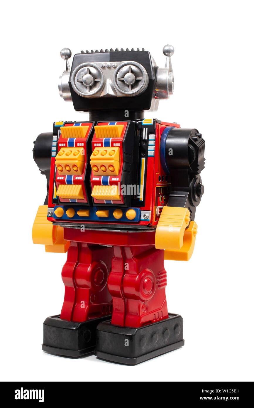 Vintage tin robot toy isolated on a white background Stock Photo - Alamy
