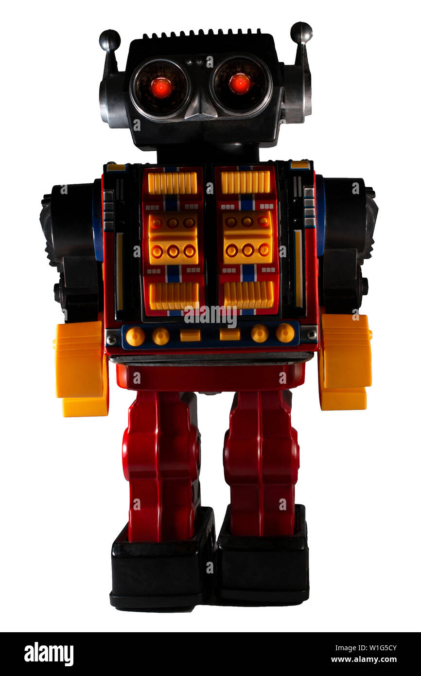 Vintage tin robot toy isolated on a white background Stock Photo - Alamy