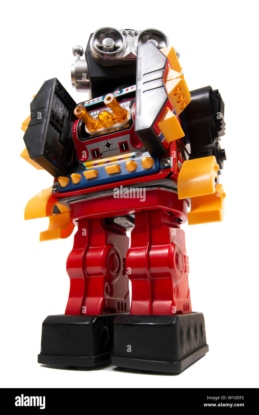 Vintage tin robot toy isolated on a white background Stock Photo - Alamy