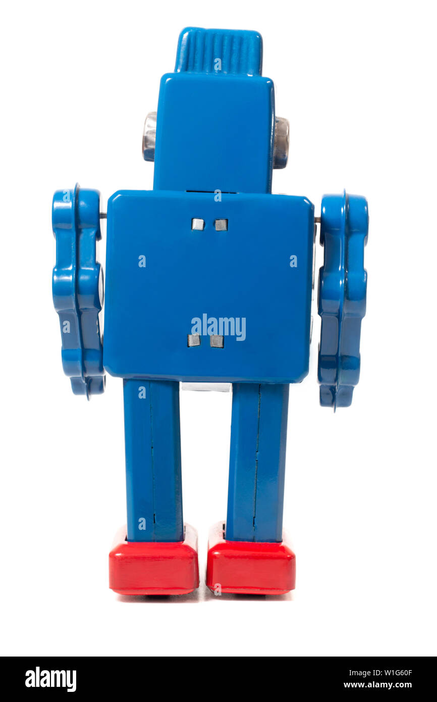 Vintage tin robot toy isolated on a white background Stock Photo - Alamy