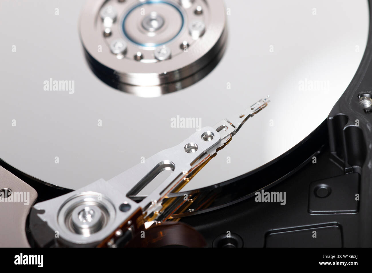 Close up view of a computer hard drive isolated on a white background ...