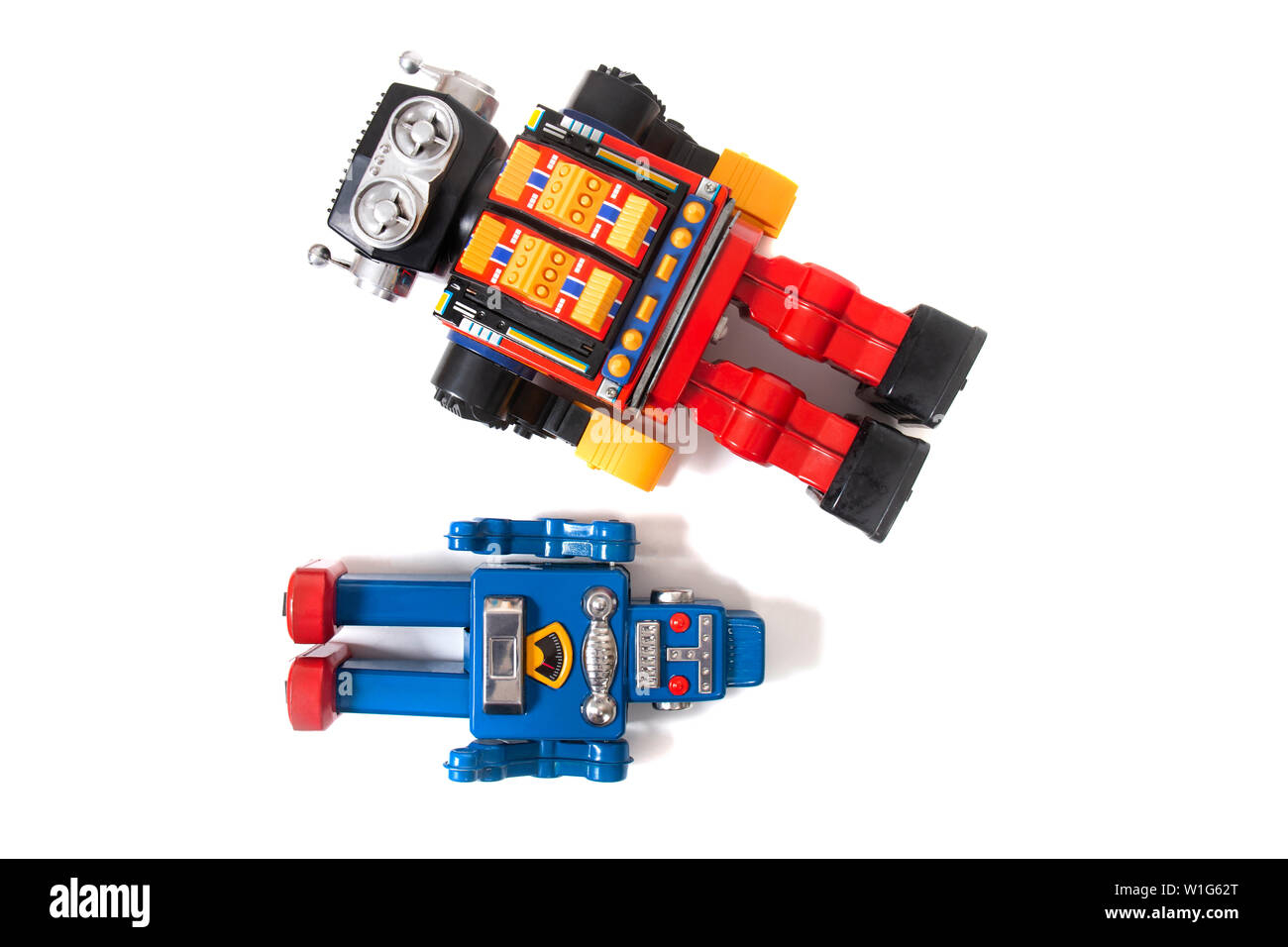 Vintage tin robot toys isolated on a white background Stock Photo - Alamy