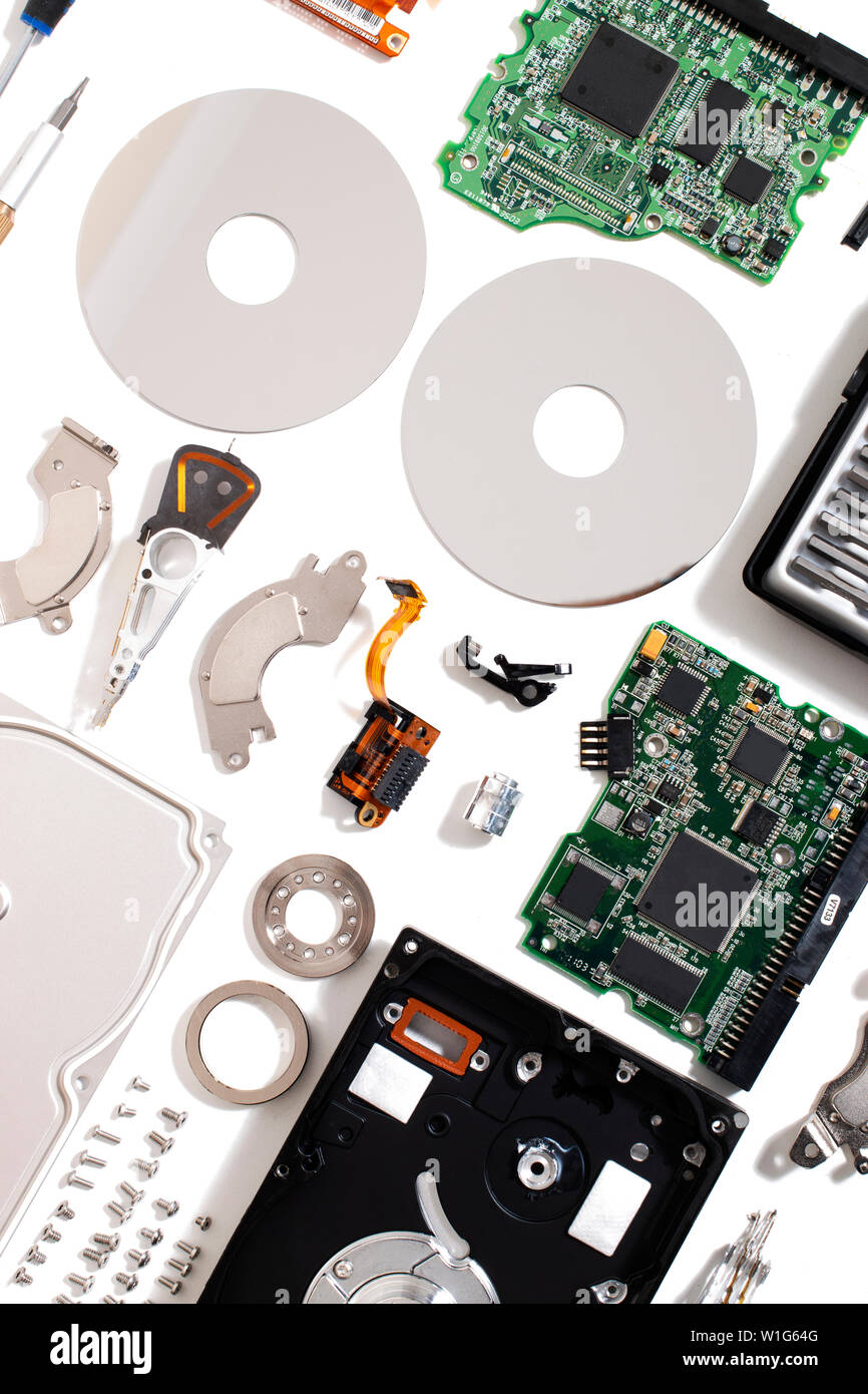 Disassembled hdd drive parts isolated on a white background Stock Photo ...