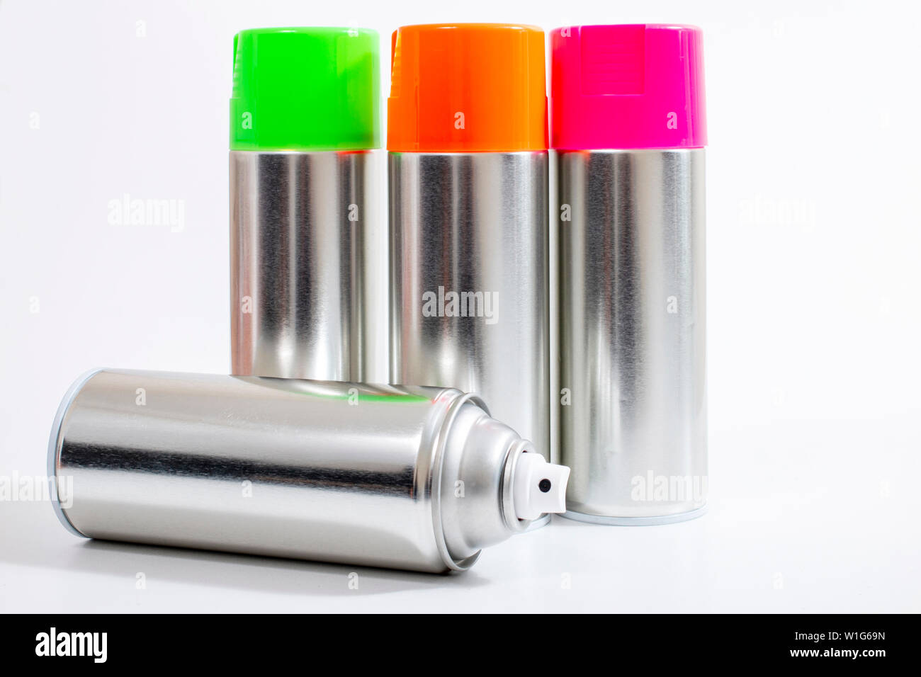Close up view of silver spray cans on a white background Stock Photo ...