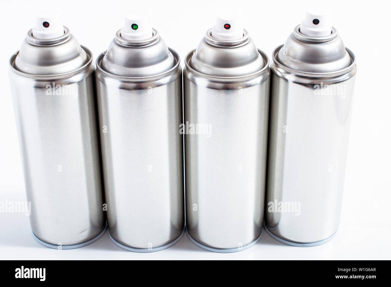 Close up view of silver spray cans on a white background Stock Photo ...