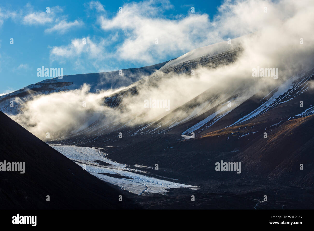 Longyear Glacier and cloudy mountains Svalbard, Spitsbergen, Svalbard ...